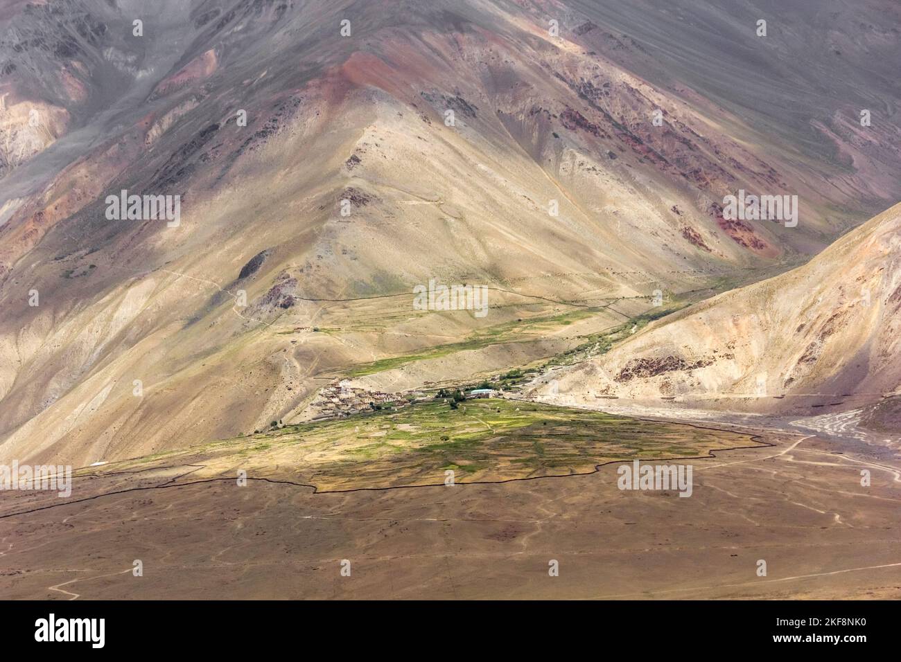 A remote Himalayan village set in the slopes of an arid mountain in the ...
