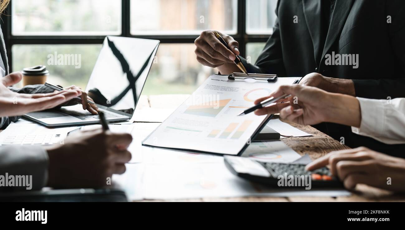 Business people are meeting for analysis data figures to plan business ...