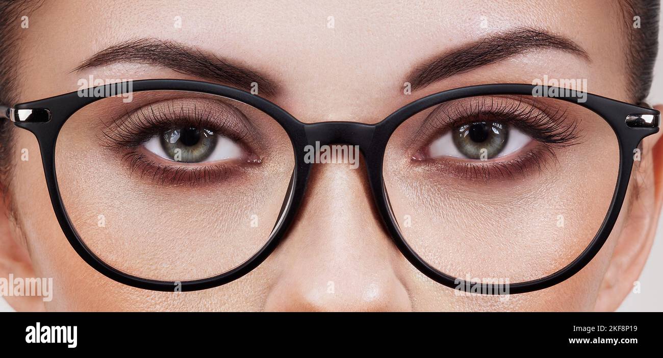Woman with long eyelashes in eyeglasses. Vision correction. Poor ...