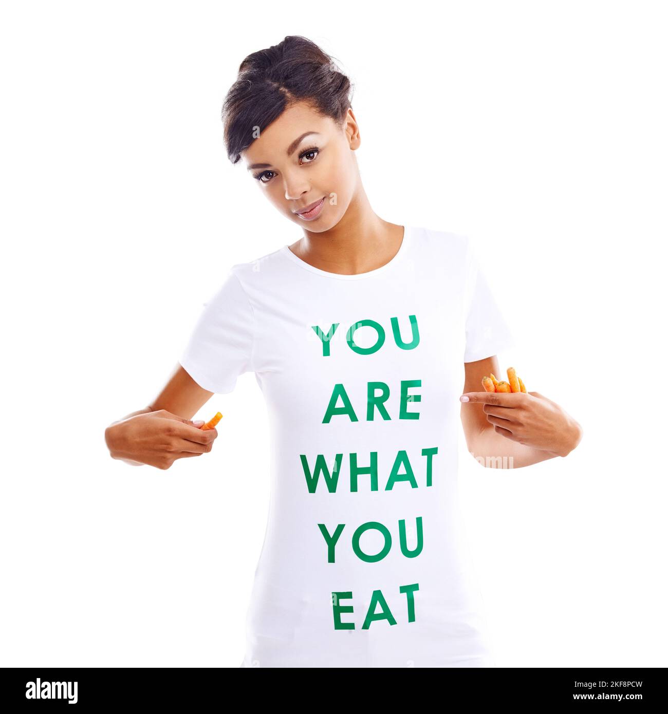 You are what you eat so make sure its healthy. Portrait of a young ...