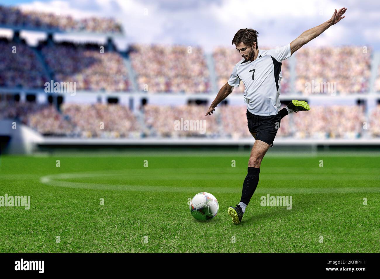 Soccer player kicking the ball Stock Photo - Alamy
