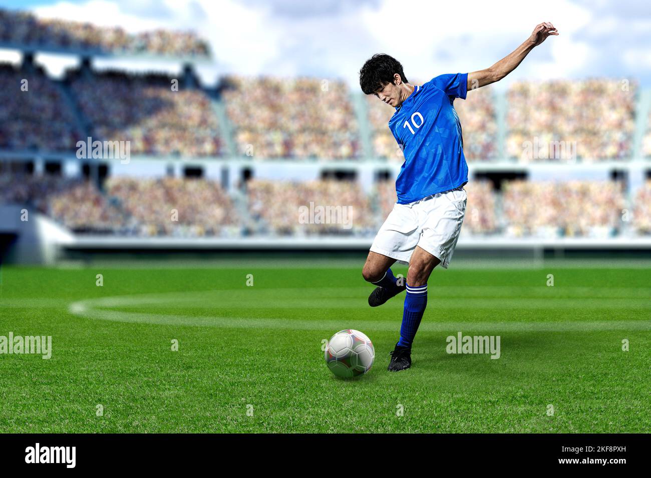 Soccer player kicking the ball Stock Photo - Alamy