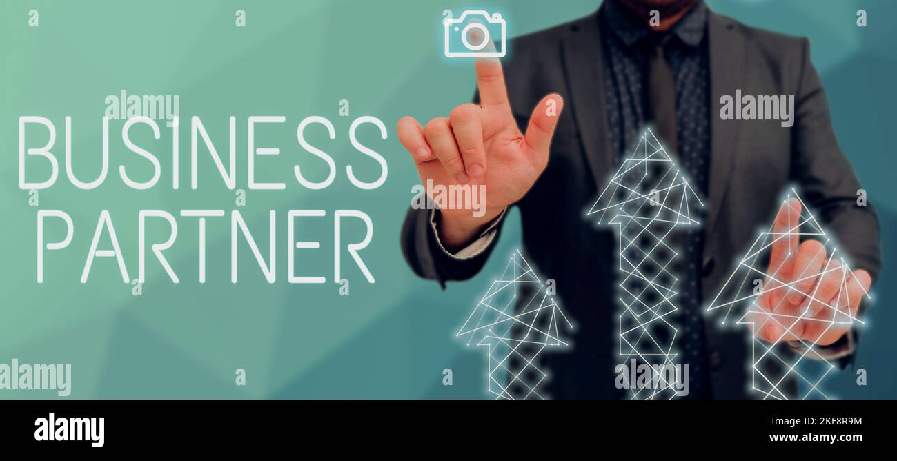 Hand writing sign Business Partner. Business overview commercial entity ...