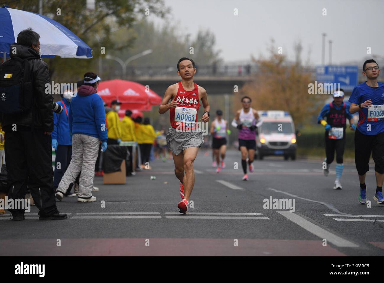 Participants run at the Beijing Marathon in Beijing, China, 6 November ...