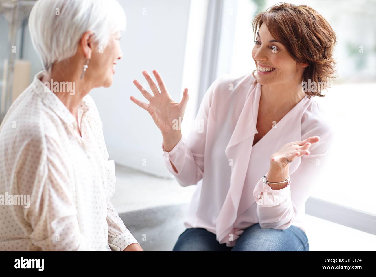 Ive got some great news. a woman spending time with her elderly mother ... Ive got some great news. a woman spending time with her elderly mother ...