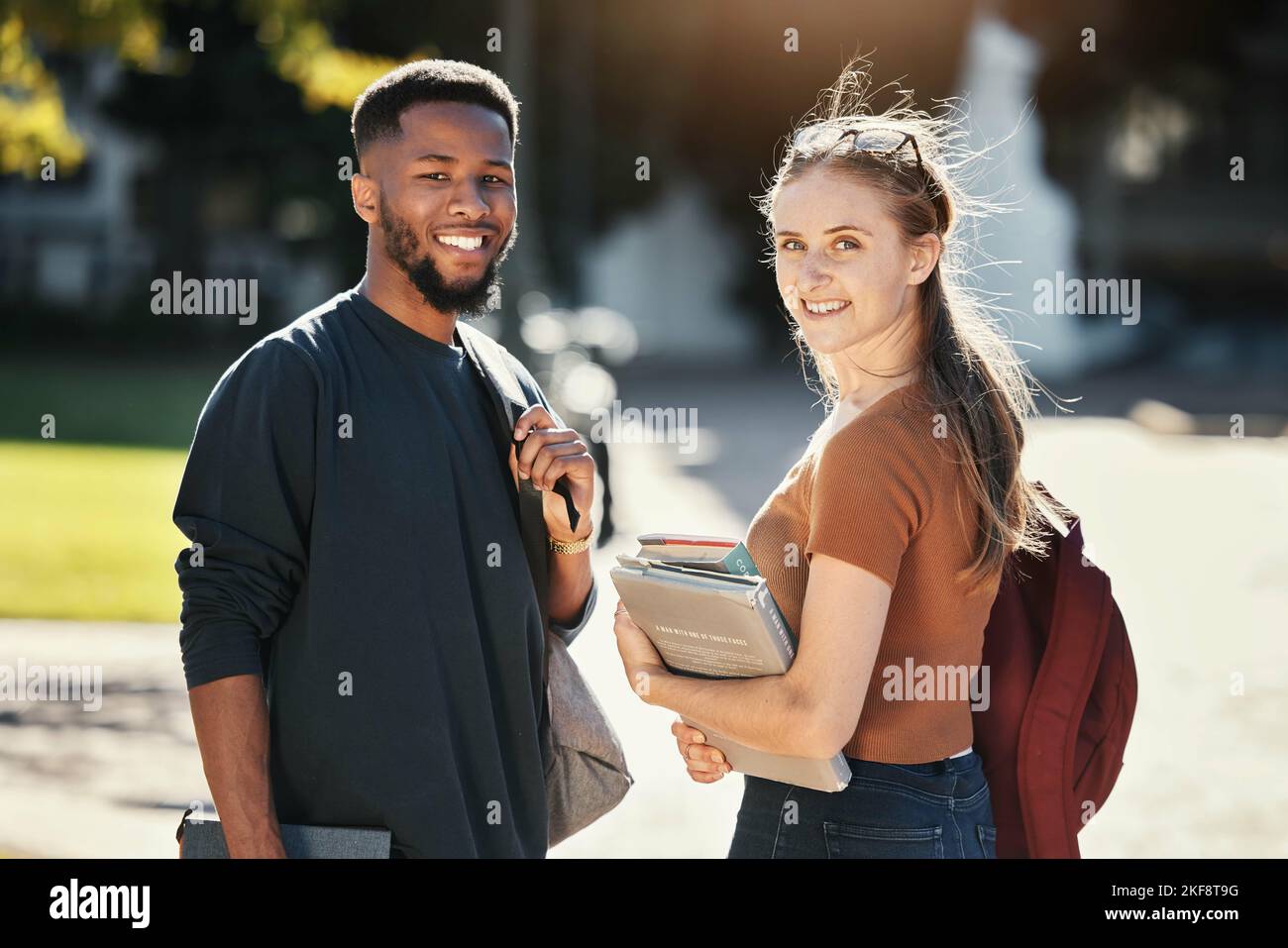 Students, couple or university friends walking together with books for ...