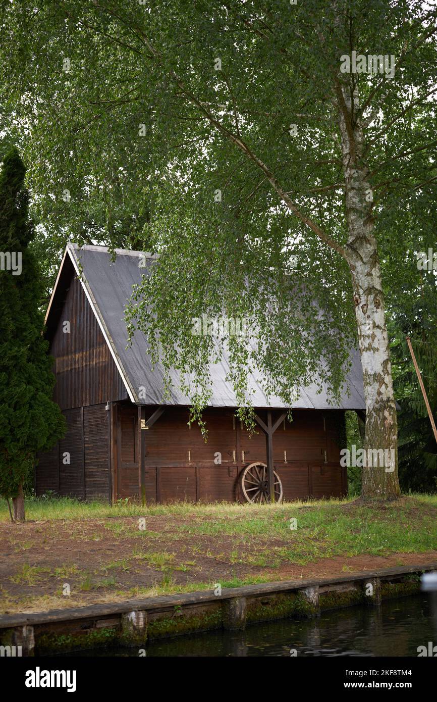 A house building facade surrounded by water in Spreewald Stock Photo ...