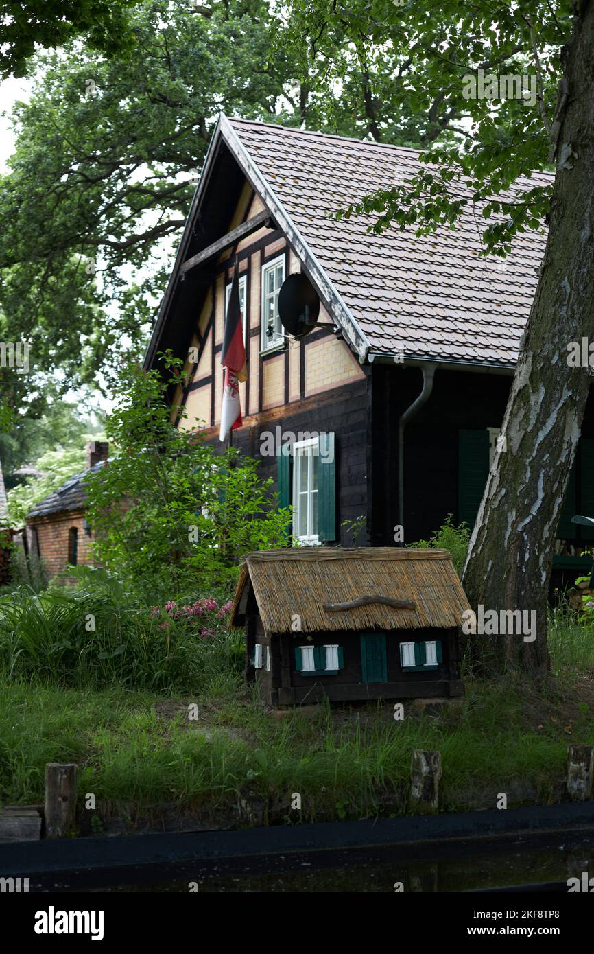 A house building facade surrounded by trees in Spreewald Stock Photo ...