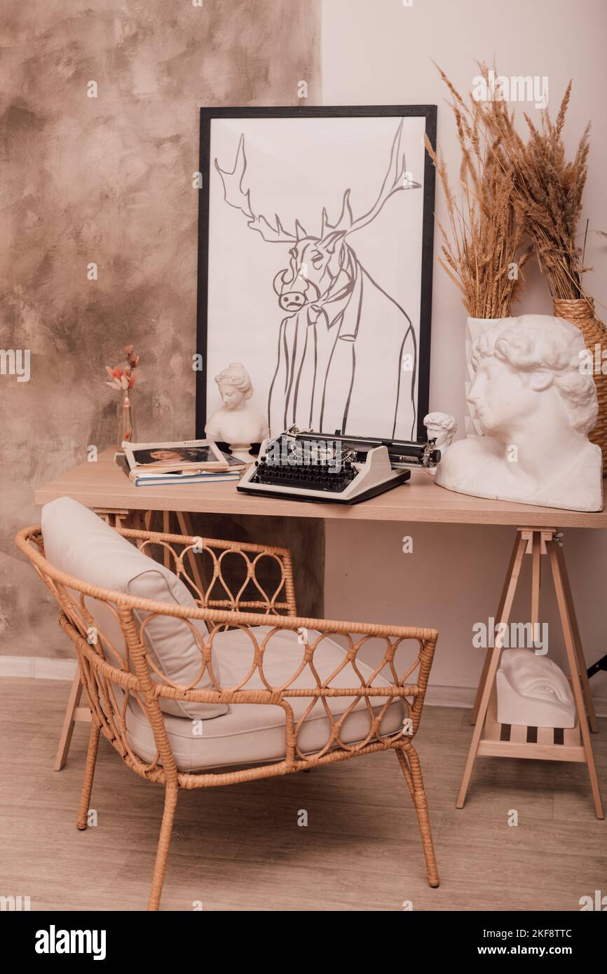 Stylish desktop with typewriter and picture. Bright home interior Stock ...