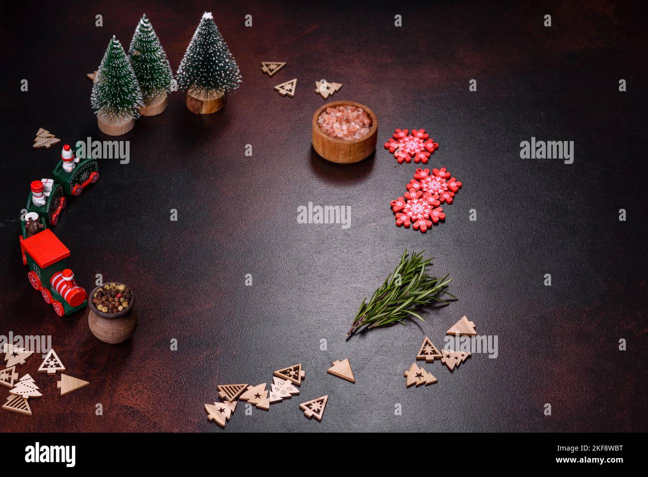 Fresh piece of raw pork with spices, salt and herbs on a wooden cutting ...