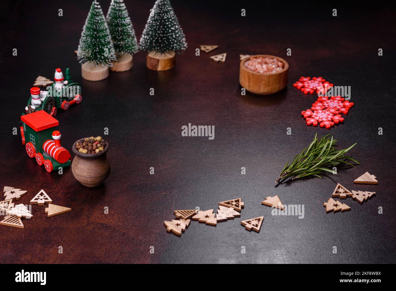 Fresh piece of raw pork with spices, salt and herbs on a wooden cutting ...