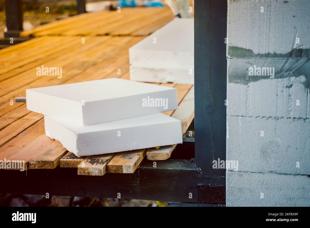 The process of external insulation of the house with polystyrene foam ...