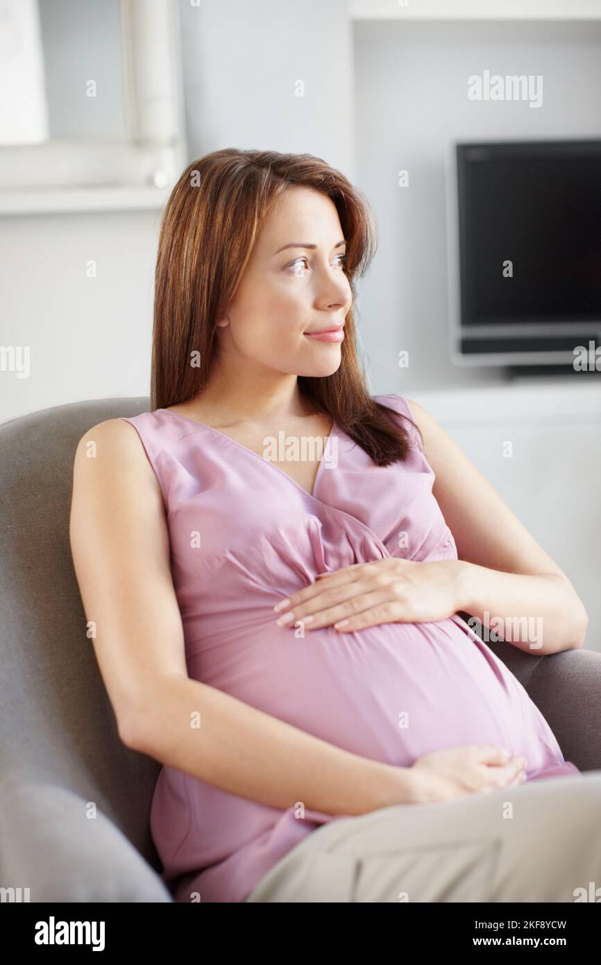 Experiencing The Perfect Pregnancy Pretty Young Pregnant Woman Looking