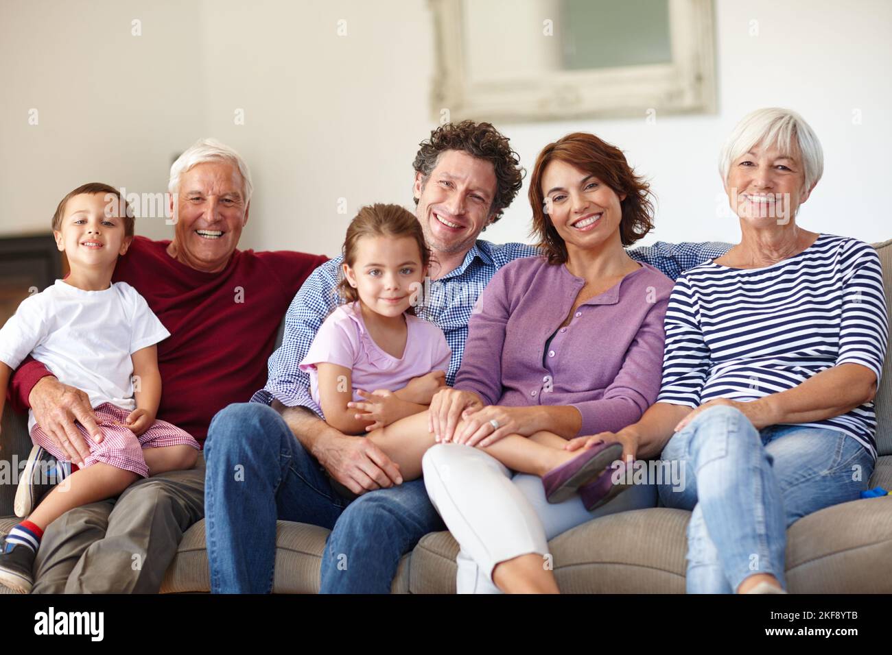 Strengthening family ties. Portrait of a happy multi-generational ...