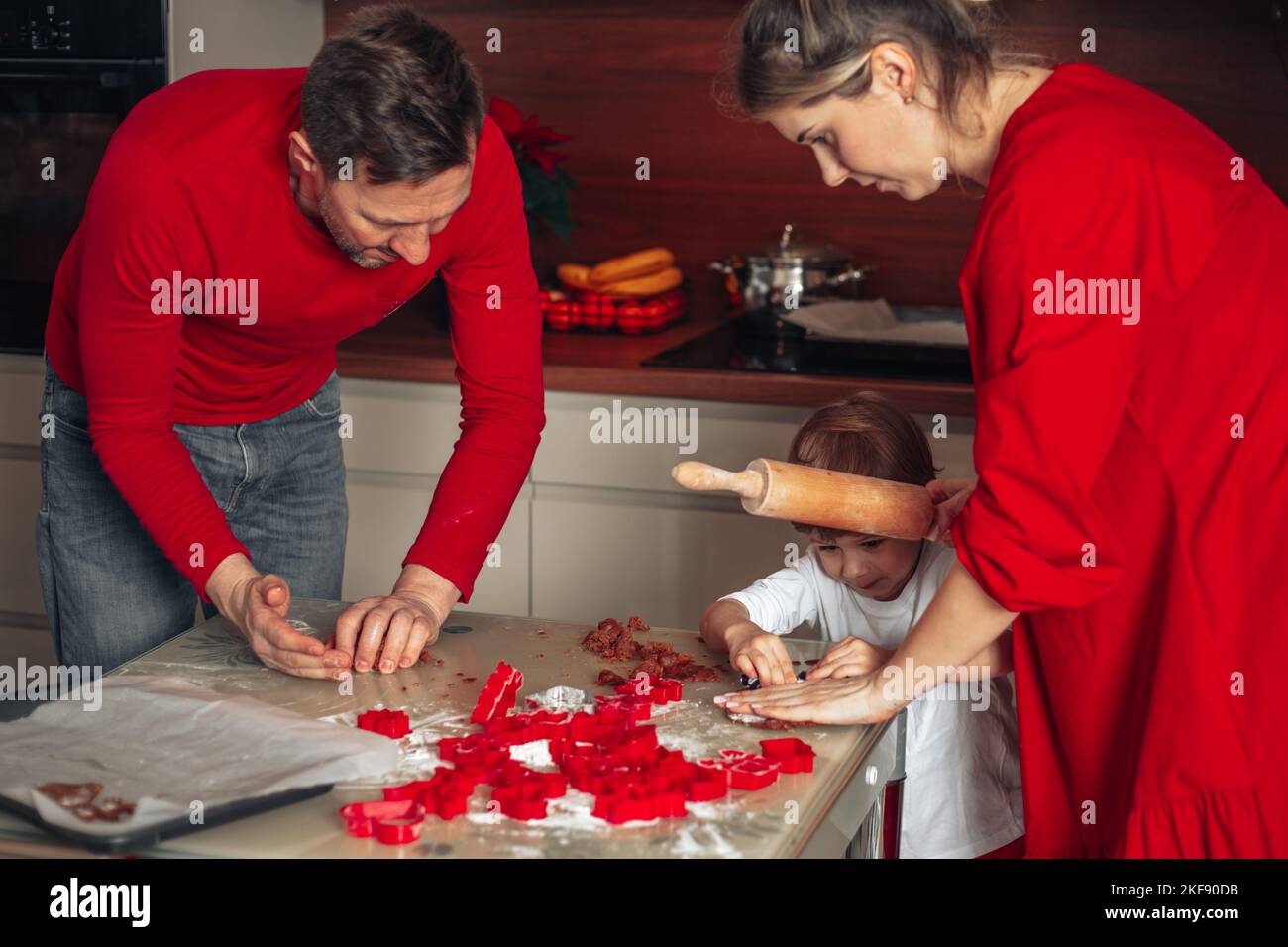 Christmas Eve, cozy evening for young family. Dad, mom and son ...