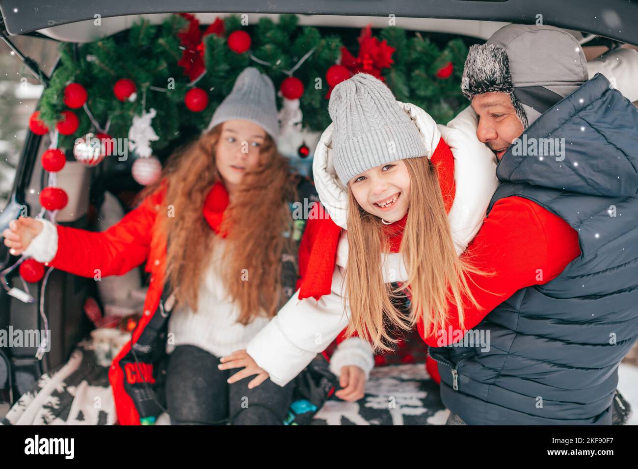 winter holidays and family concept, happy middle-aged father and two ...