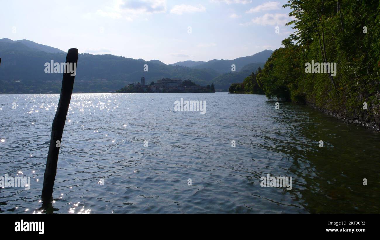 Lago Maggiore Italy mirroring Water contrast palm Stock Photo - Alamy