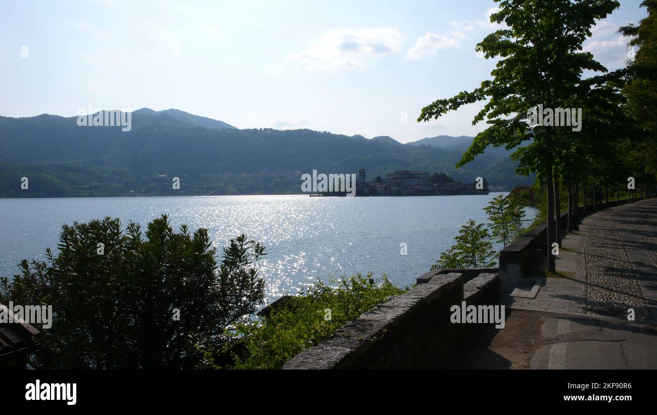 Lago Maggiore Italy mirroring Water contrast palm Stock Photo - Alamy
