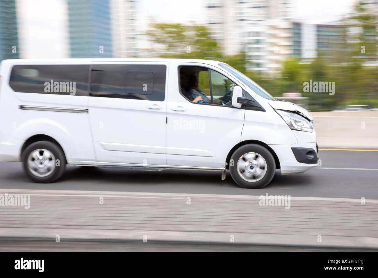 Photograph of a fast-moving transport vehicle with panning technique ...