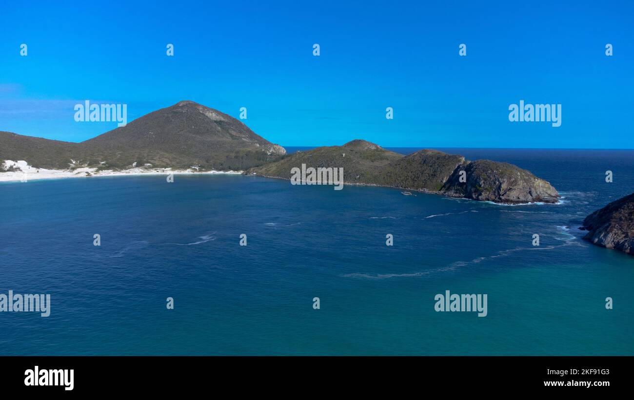 A landscape of cliffs in the sea on a sunny day in Fenda de Nossa ...