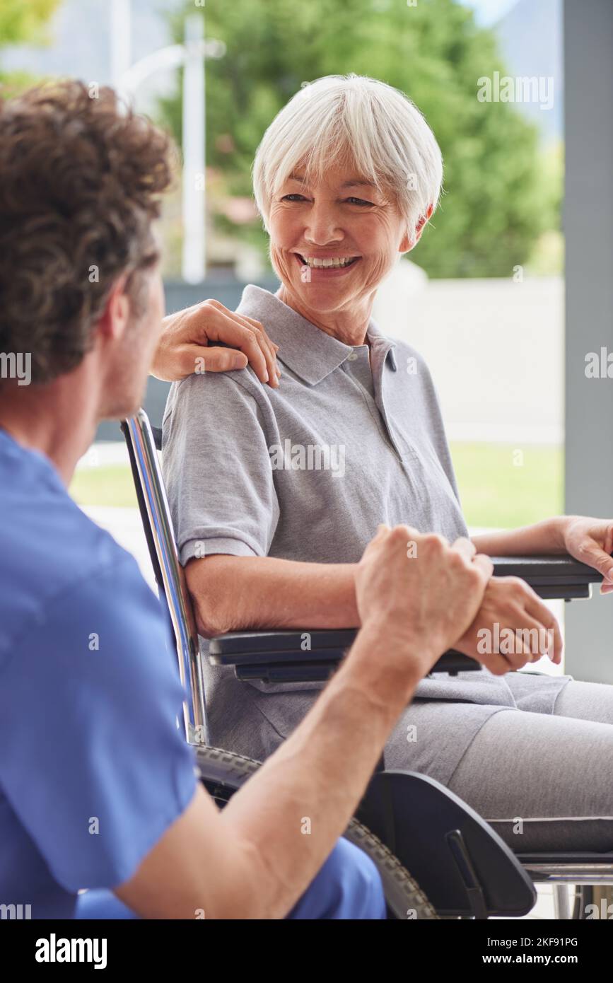 On the way to a full recovery. a happy senior woman in a wheelchair ...