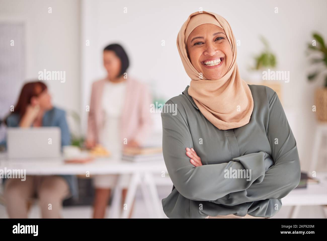 Leadership, business and portrait of Muslim woman in office, crossed ...