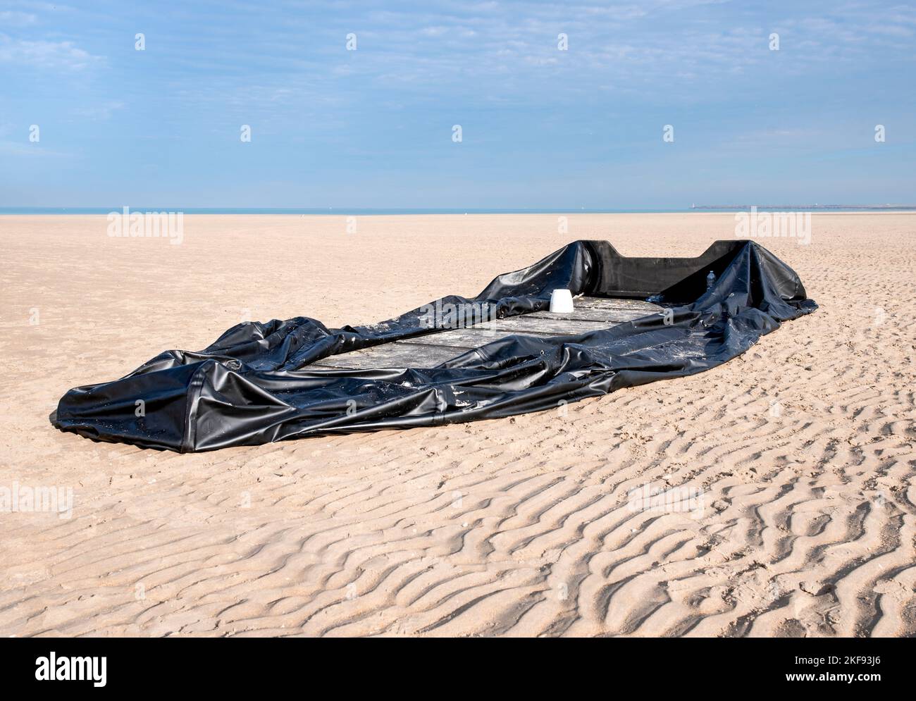 Dunkirk, France, November 13th 2022, Discarded refugee boat, deflated ...