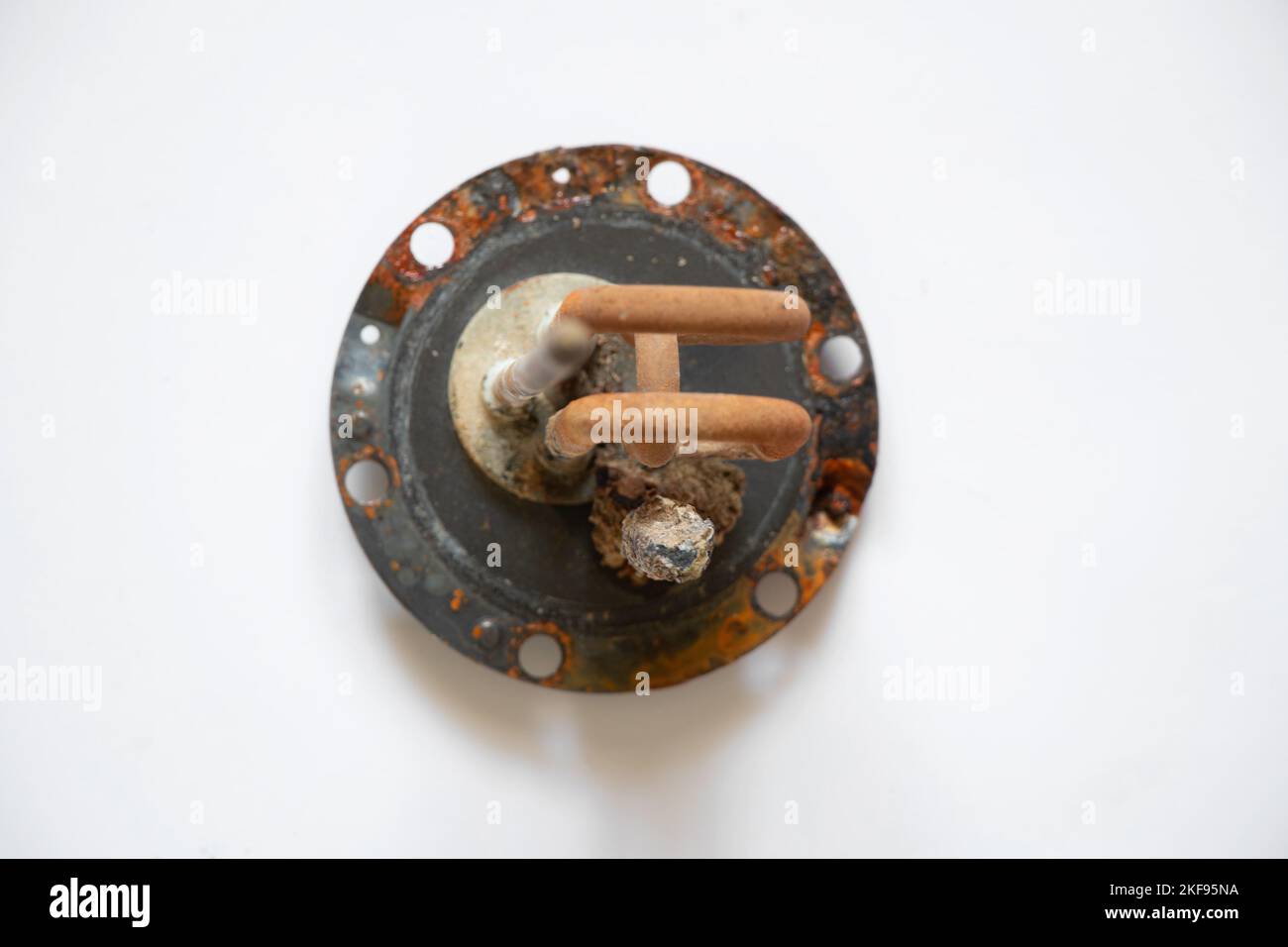 heating ten from a water heater after 8 years of operation broken on a ...