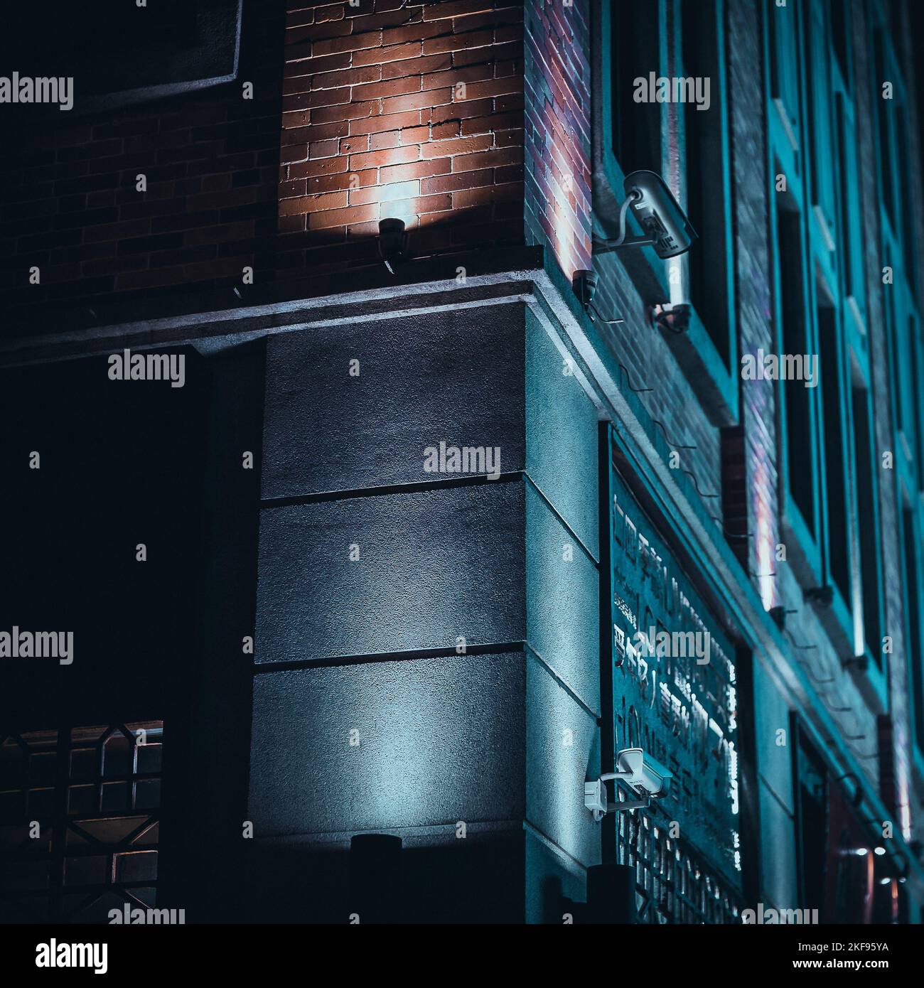 A closeup shot of a building wall made of brick lighted up by small ...