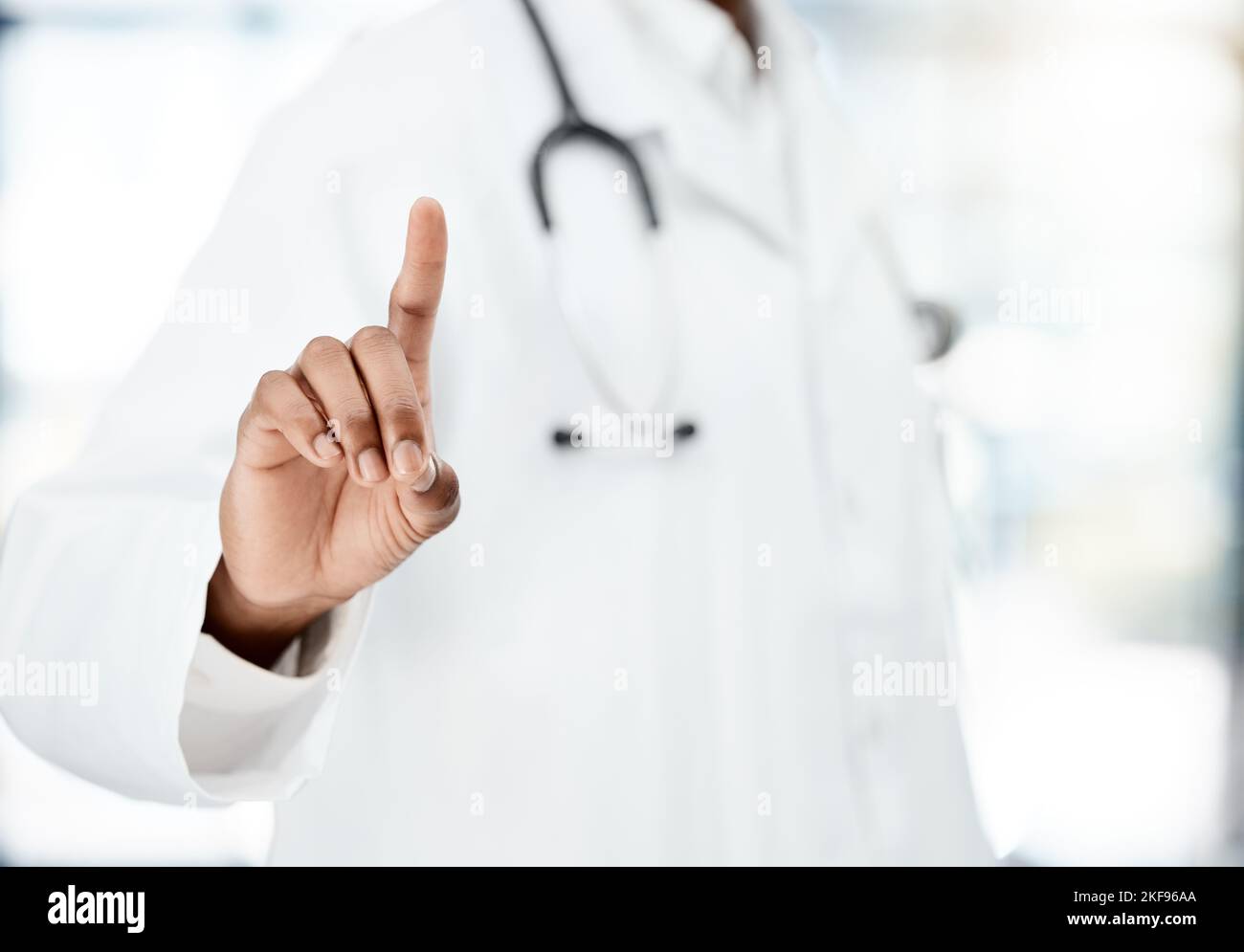 Hand, healthcare and touchscreen with a doctor black man using a ...