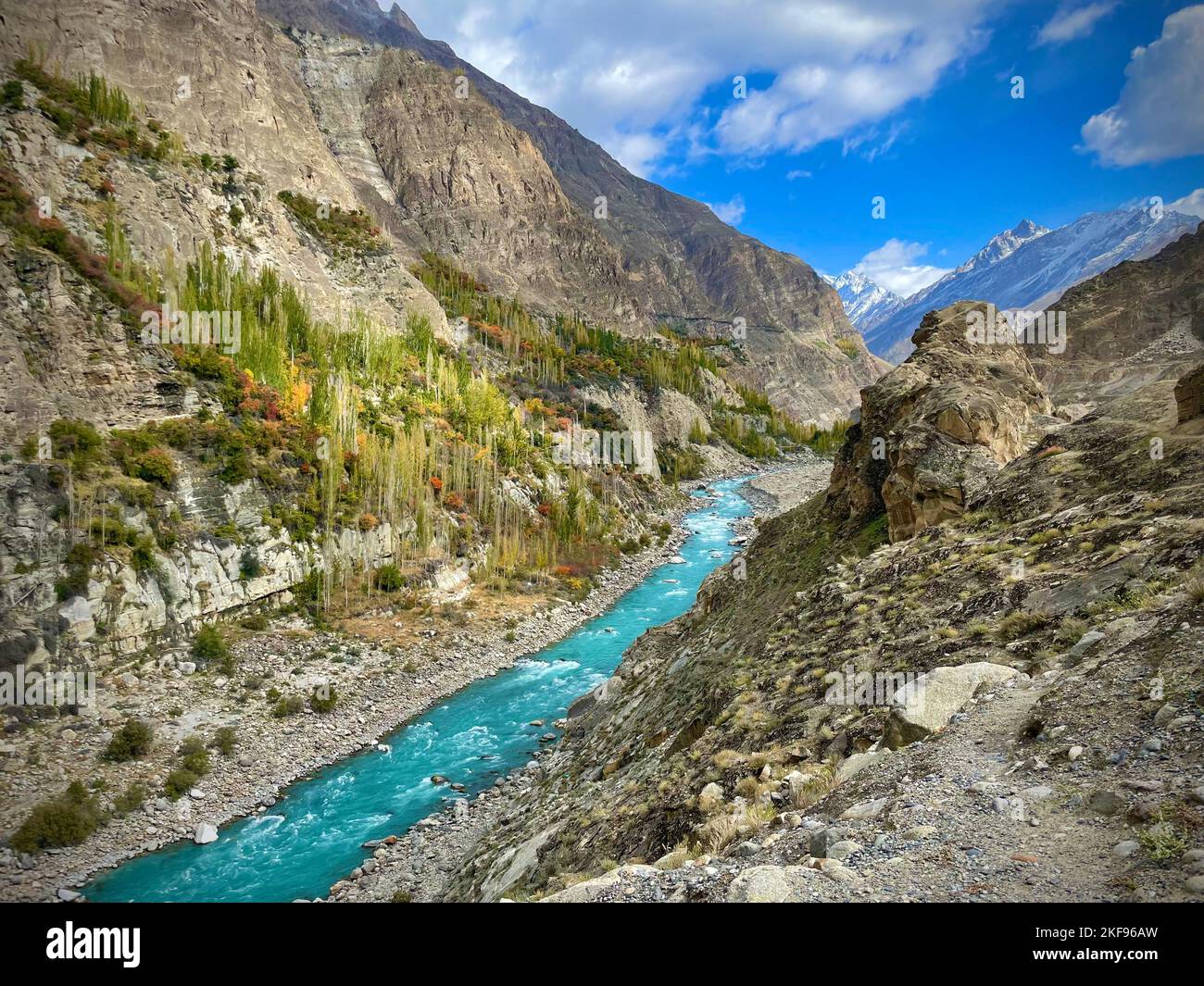 Mountainous Landscape and a bright blue river in Karimabad in the ...