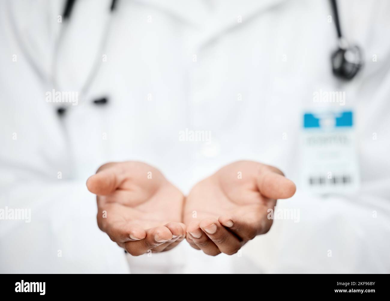 Product placement, healthcare and doctor with hands for help, support ...