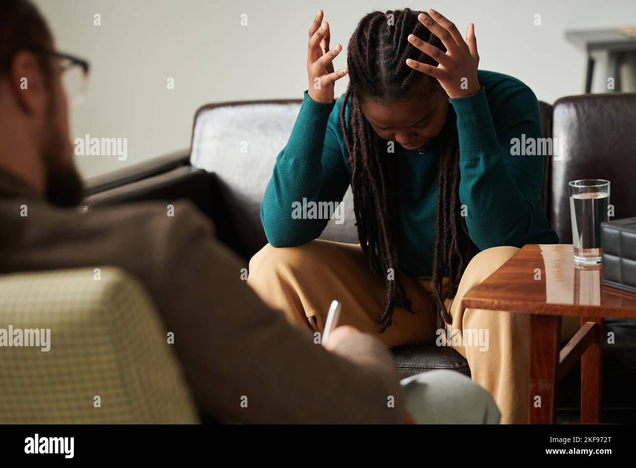 African American young patient expressing her anger sitting at ...