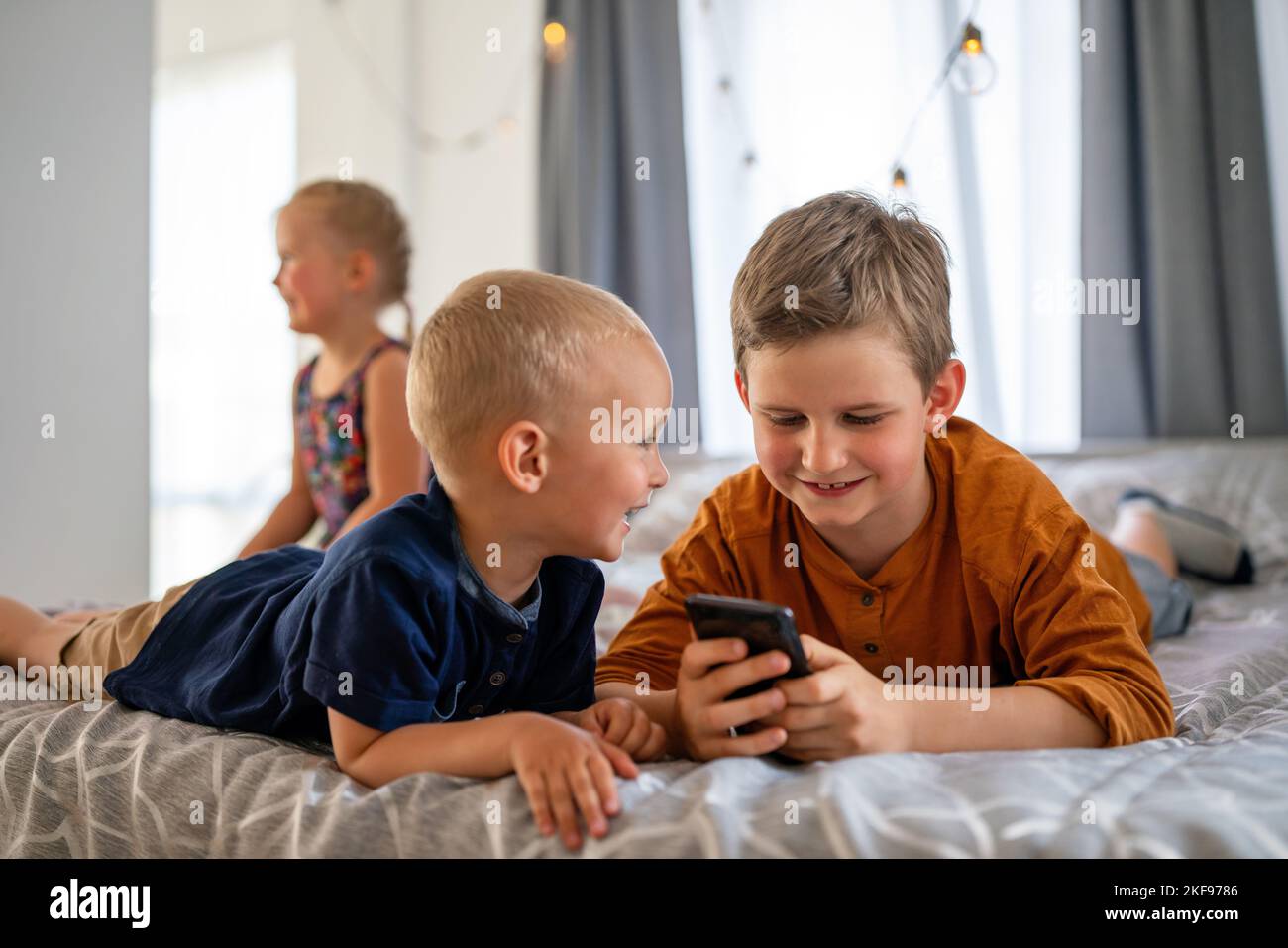 Childhood technology kids smartphone concept. Happy little children ...