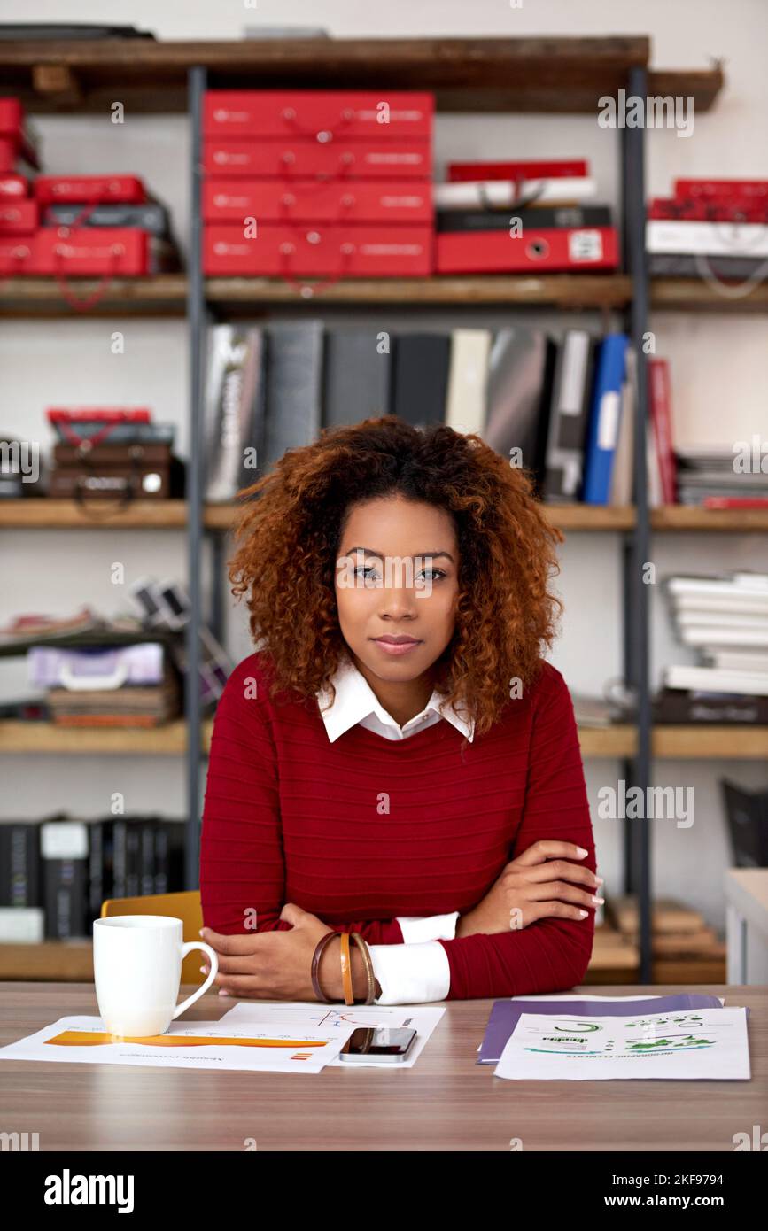 Success takes determination and hard work. Potrait of a young woman in ...