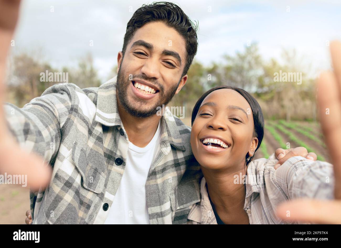 Selfie, happy and interracial couple farming for their small business ...