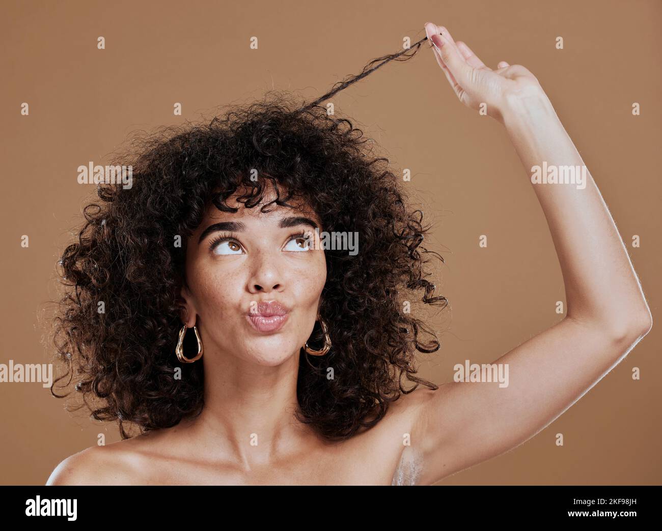 Hair care, black woman and hairstyle health texture of a model holding ...