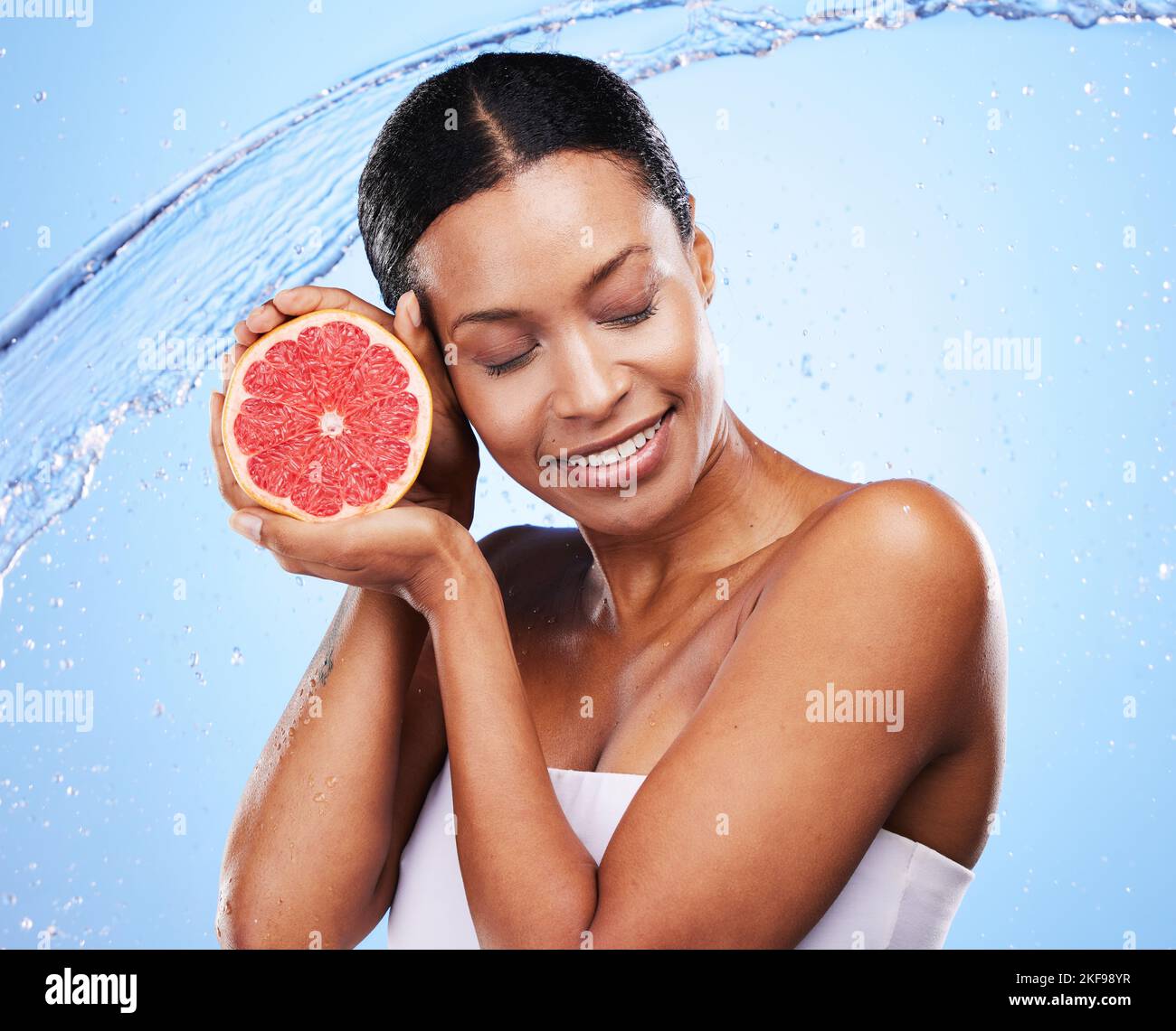 Grapefruit, black woman and water splash, beauty and skincare, vitamin c and healthy natural ...