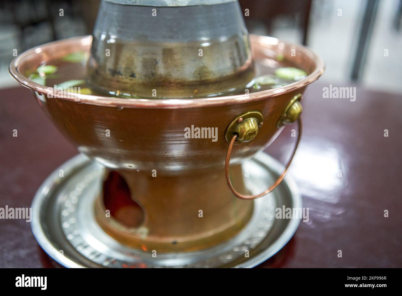 Traditional and delicious old Beijing copper pot mutton Stock Photo - Alamy
