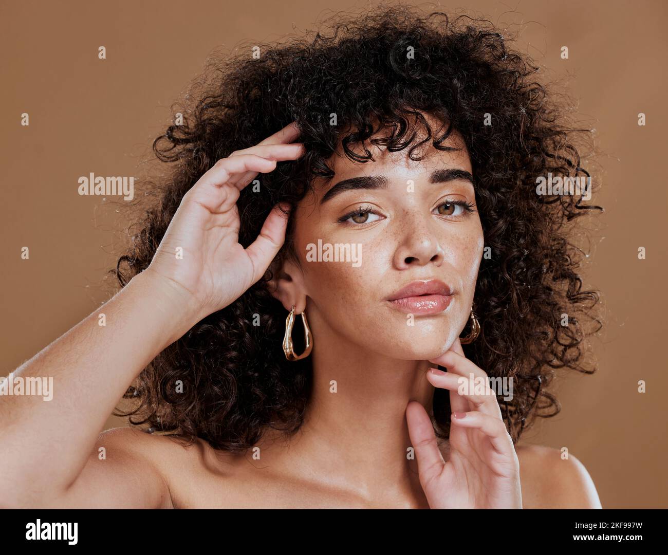 Beauty, face and hands with woman in skincare portrait, curly hair and ...