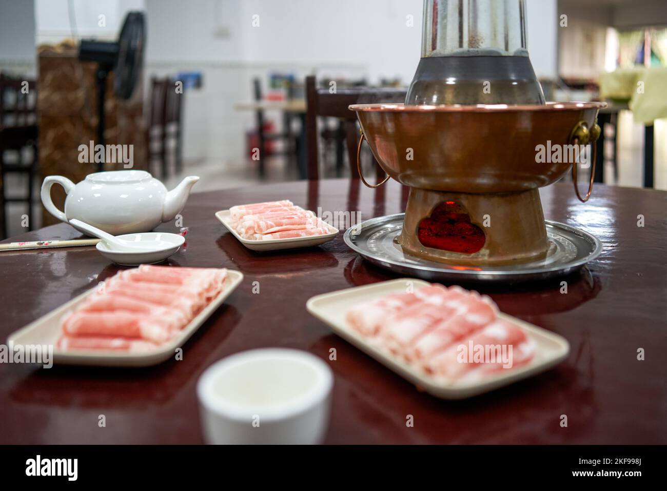 Traditional and delicious old Beijing copper pot mutton Stock Photo - Alamy