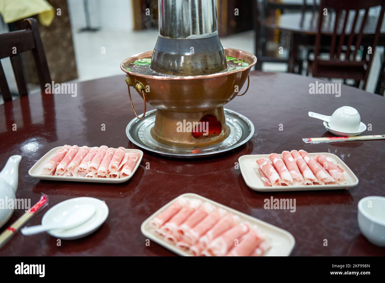 Traditional and delicious old Beijing copper pot mutton Stock Photo - Alamy