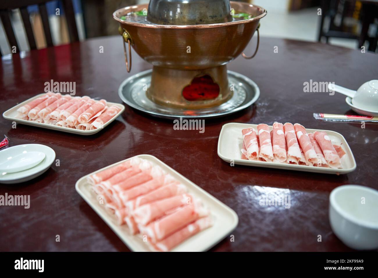 Traditional and delicious old Beijing copper pot mutton Stock Photo - Alamy