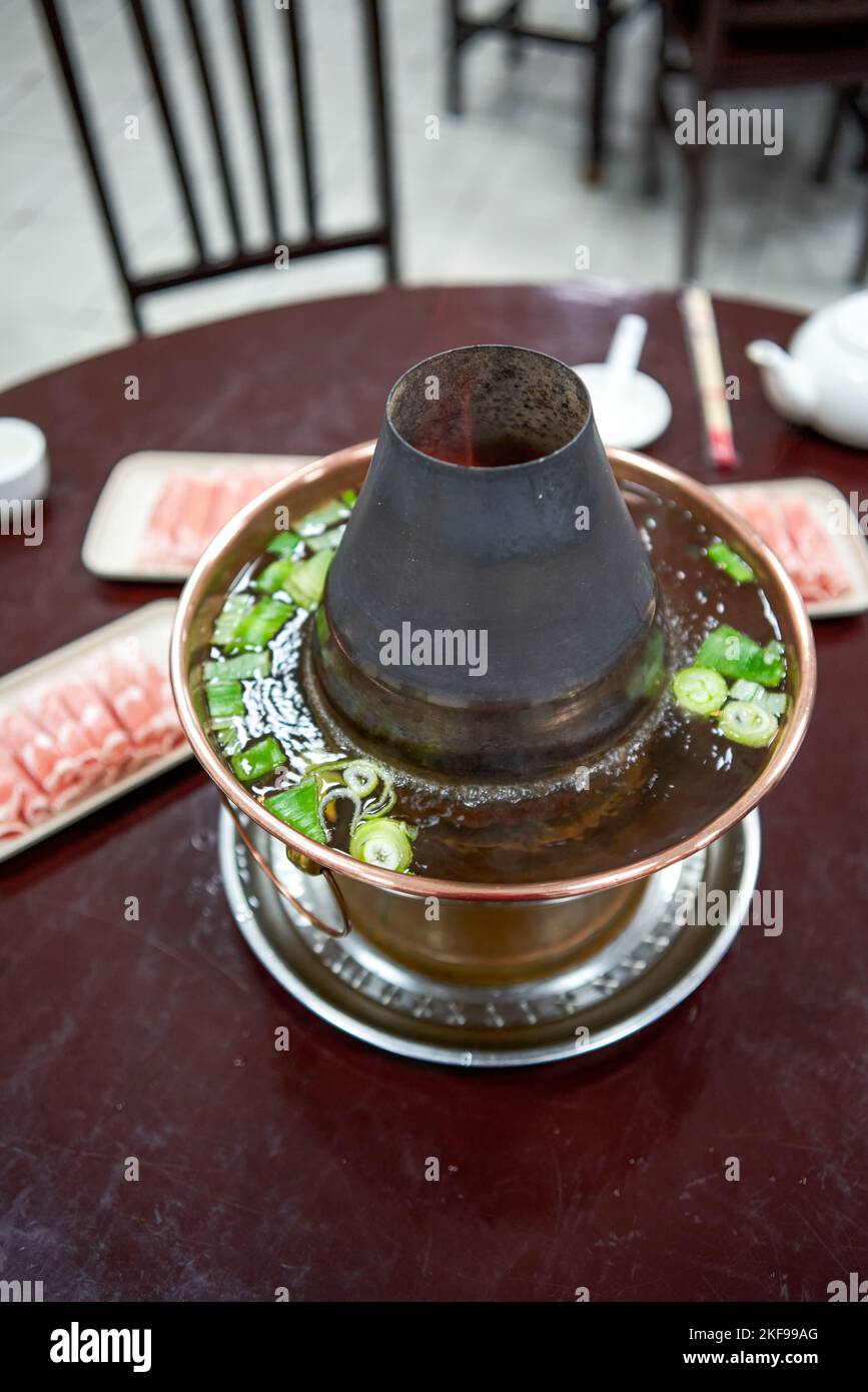 Traditional and delicious old Beijing copper pot mutton Stock Photo - Alamy