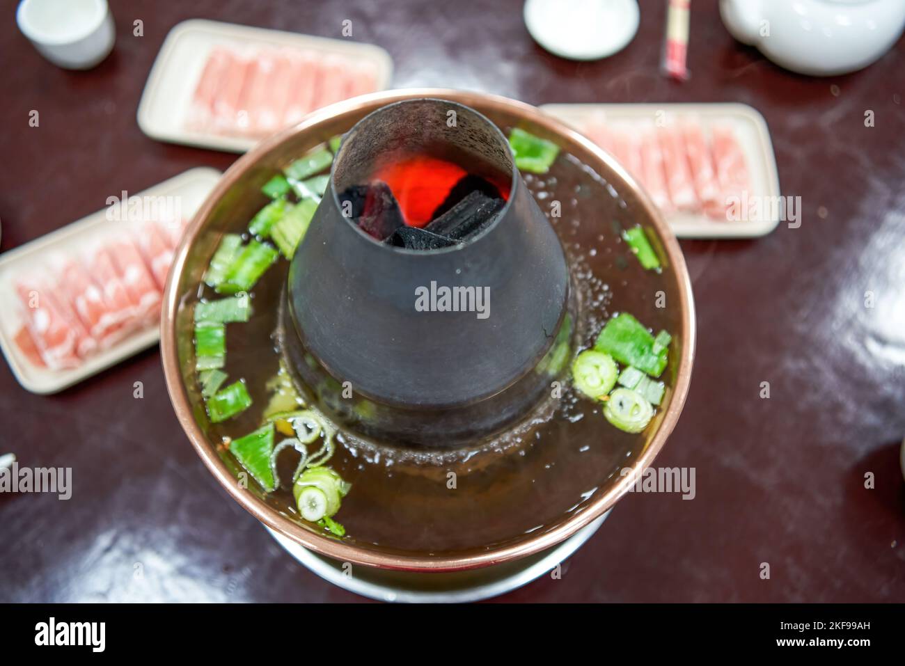 Traditional and delicious old Beijing copper pot mutton Stock Photo - Alamy