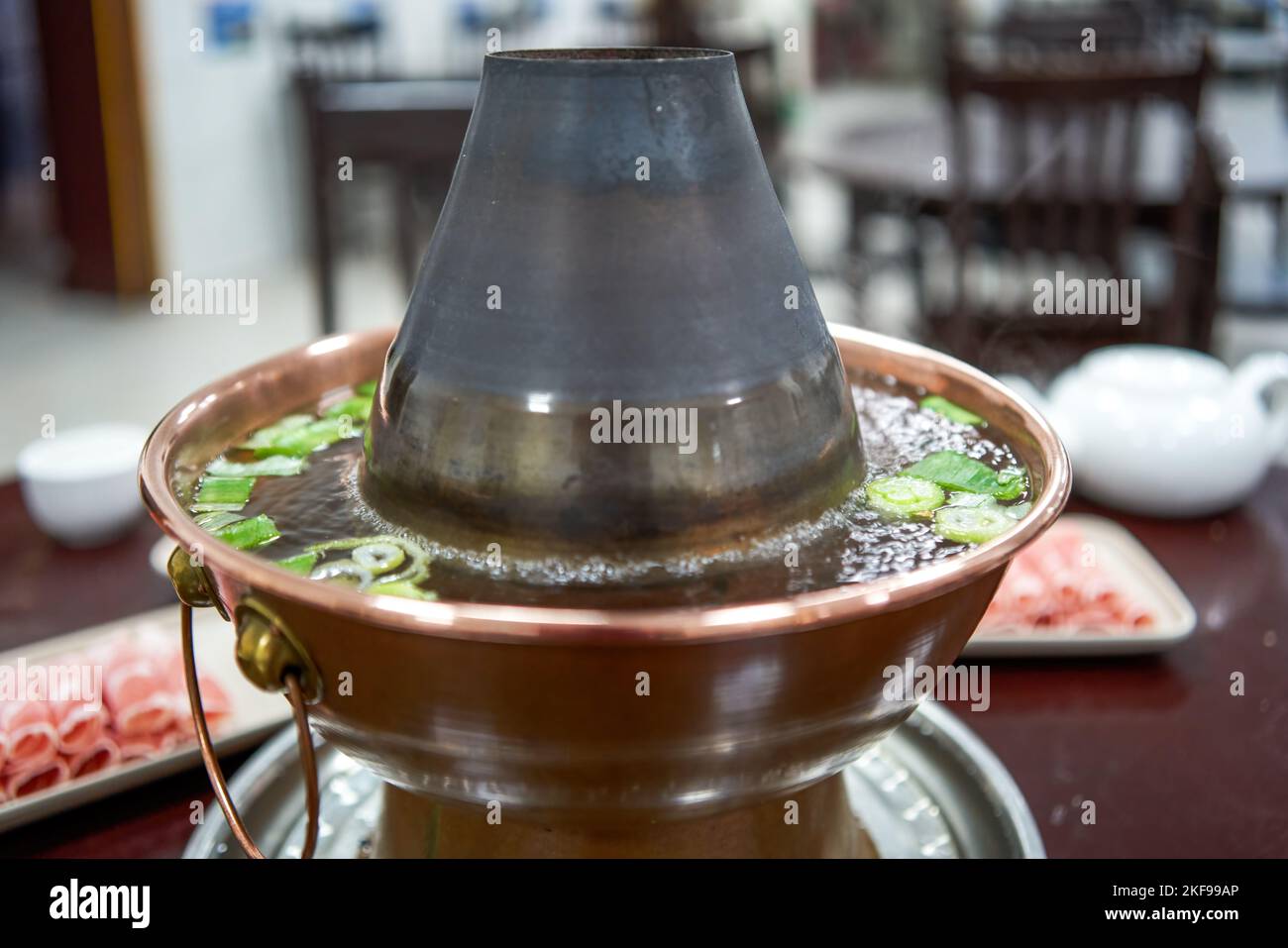 Traditional and delicious old Beijing copper pot mutton Stock Photo - Alamy