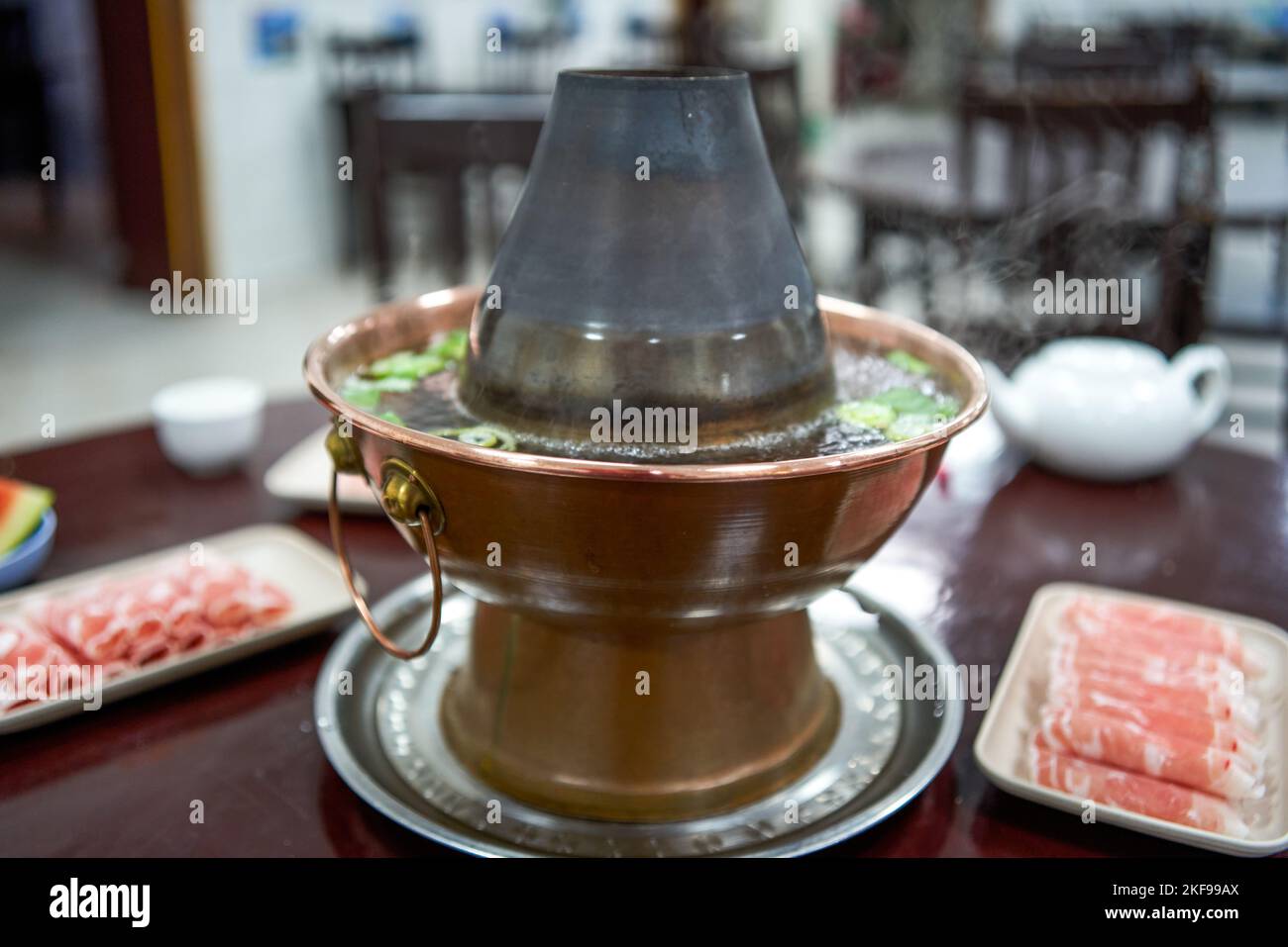 Traditional and delicious old Beijing copper pot mutton Stock Photo - Alamy