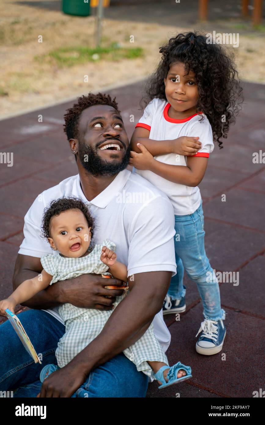 Children loving hi-res stock photography and images - Alamy