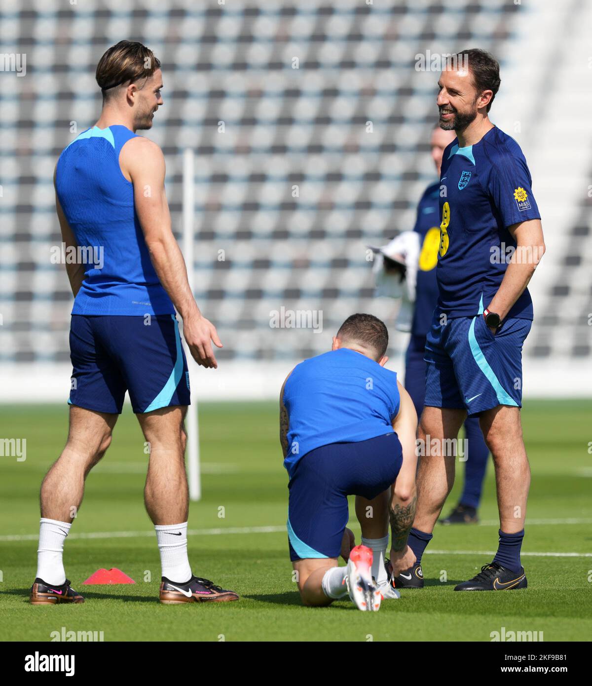 England manager Gareth Southgate speaks to Jack Grealish (left) during ...