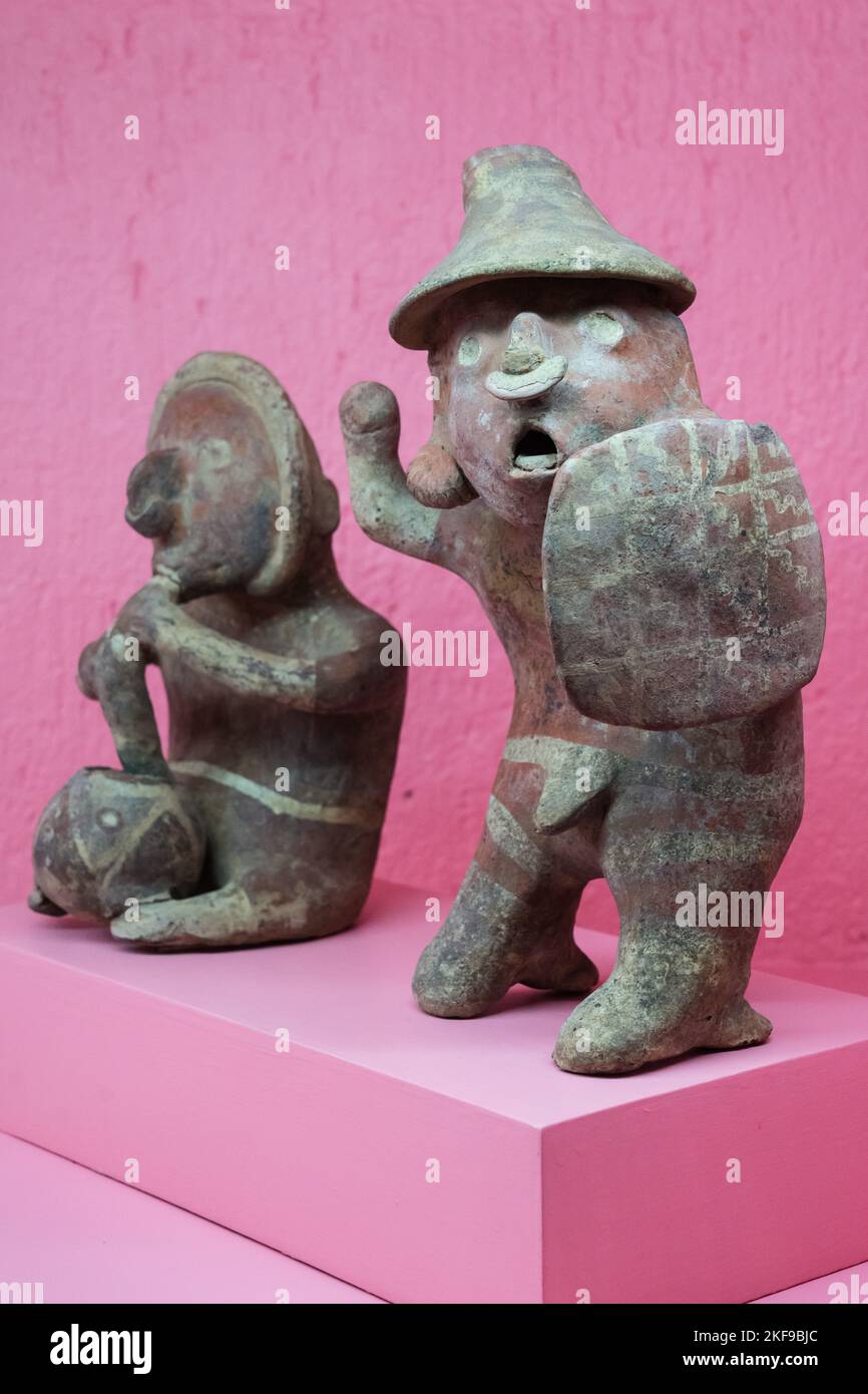 Ceramic figures of a warrior and a seated man, from Nayarit. Rufino ...